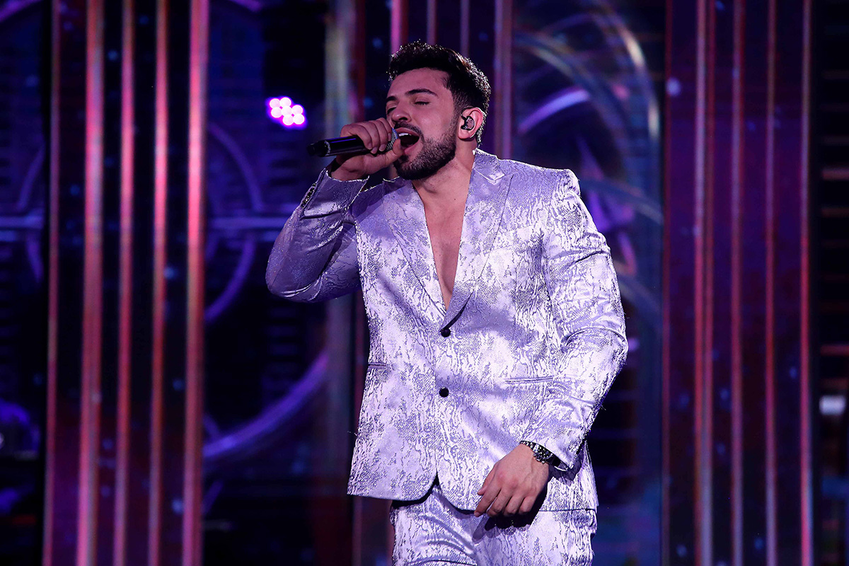 Caio Afiune curte show de Henrique Casttro